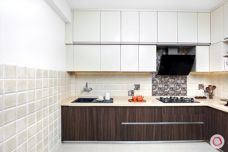 Two-Toned Brown Kitchen With Loft In Bengaluru